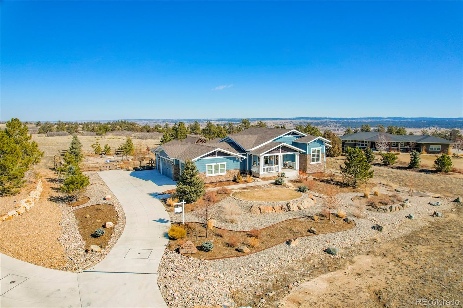 Ranch Style Home With Panoramic Landscaped Views